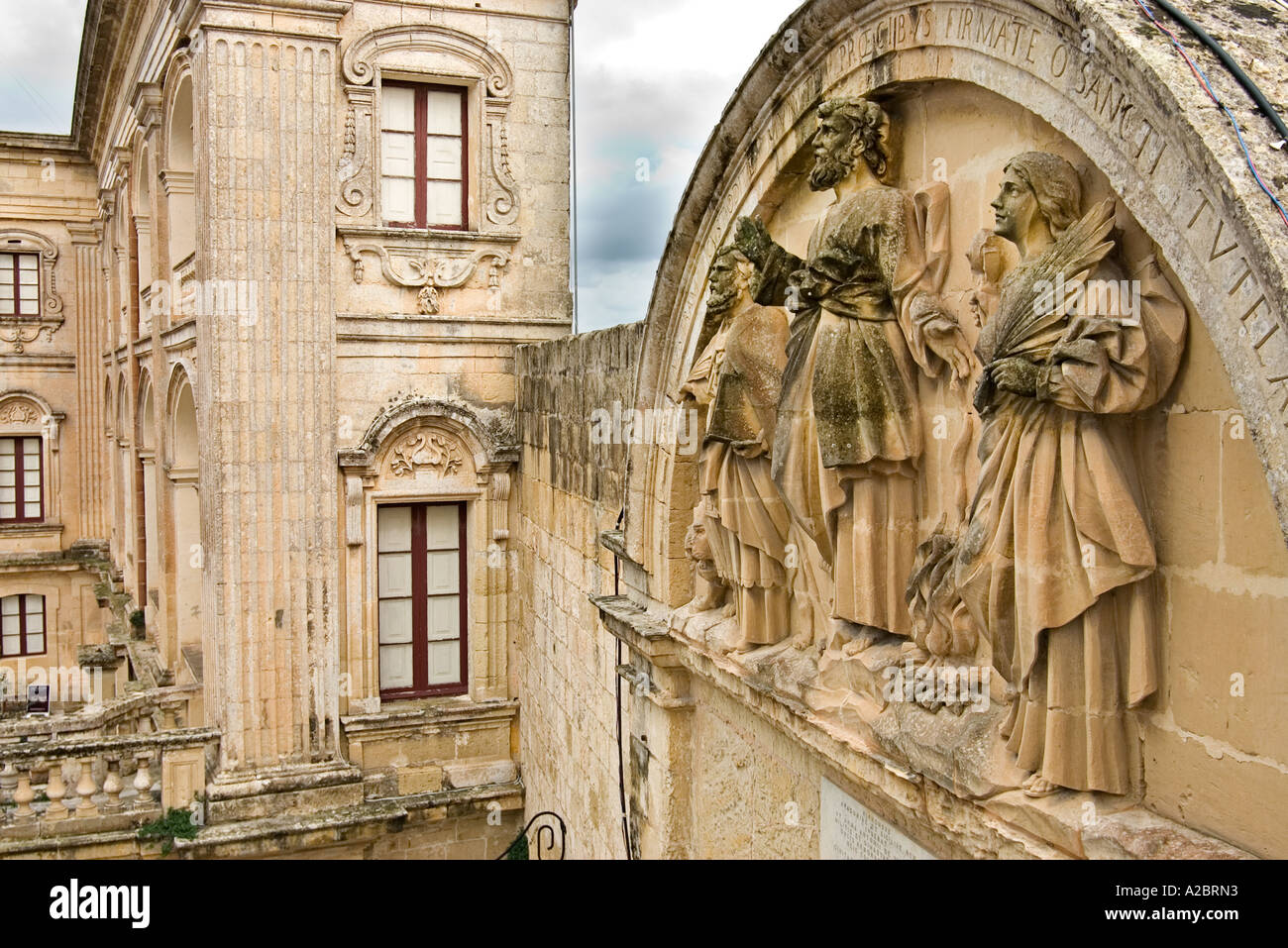 statues above the city gate Stock Photo - Alamy