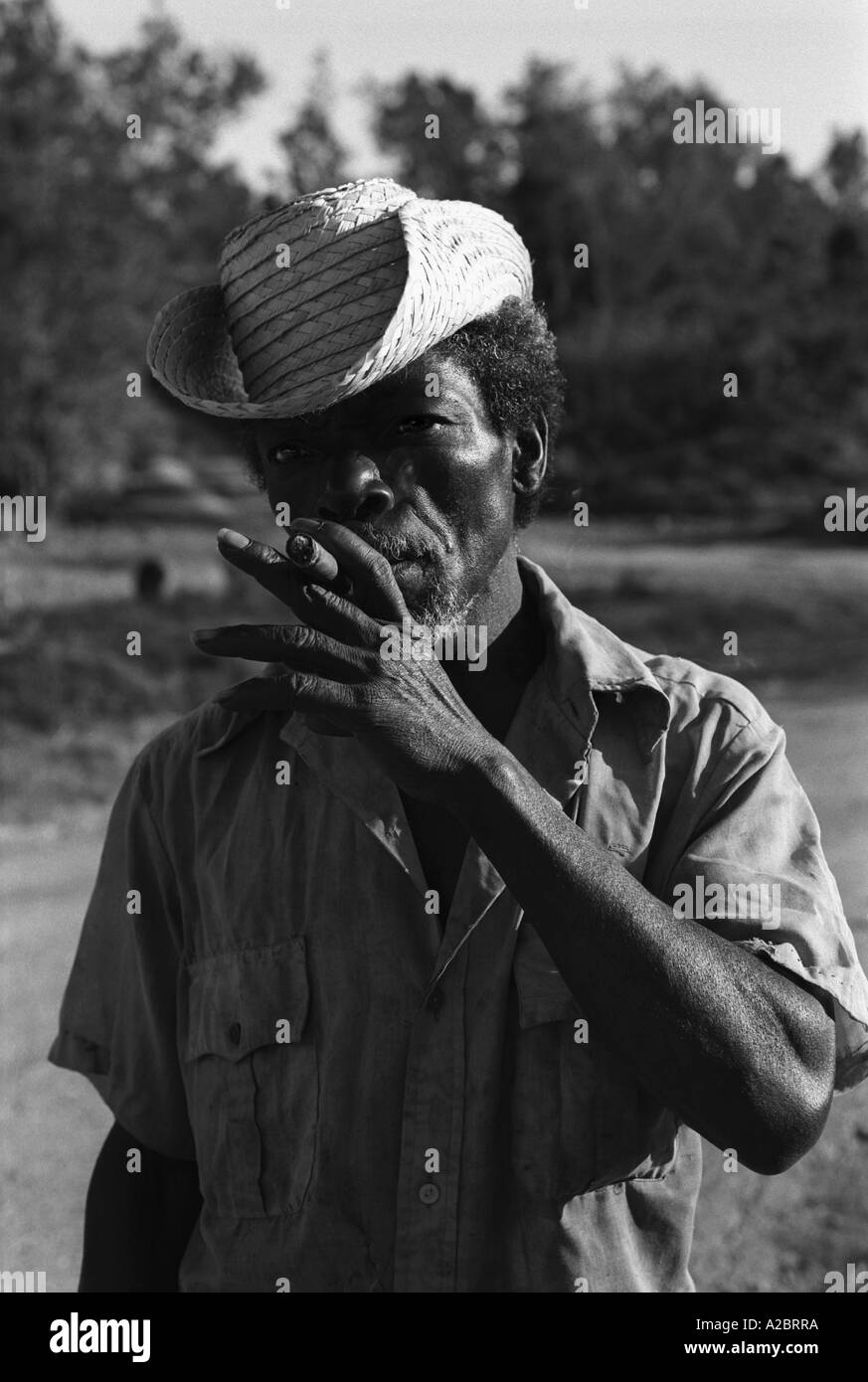 Black cuban farmer smoking Stock Photo - Alamy