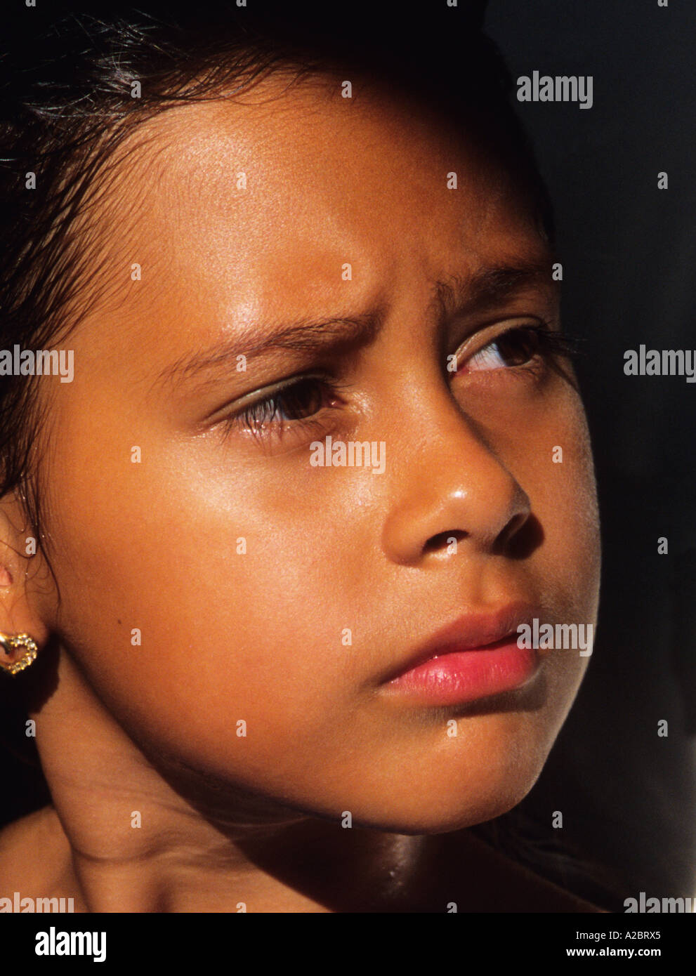 Portrait of a Eight Nine Ten Year Old Girl Scowling New York City USA ...