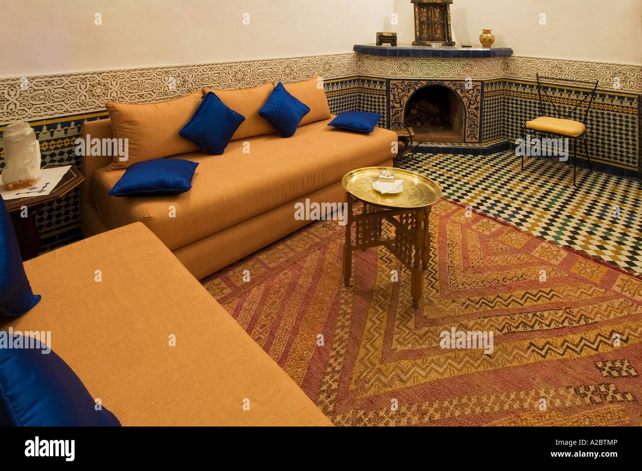 Seating lounge and fireplace at Riad Cle De Fes traditional restored ...