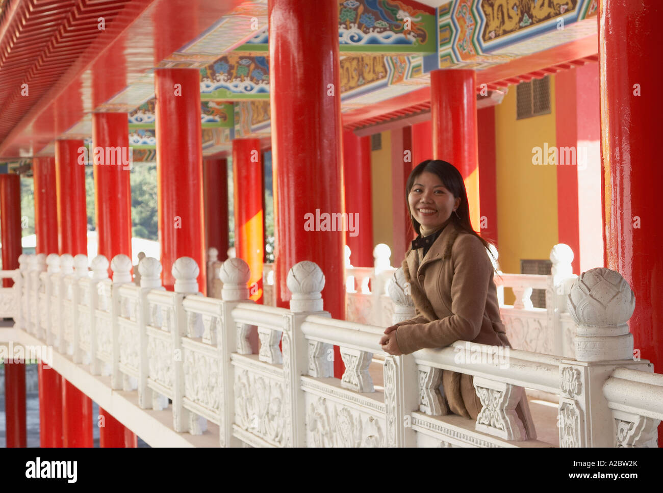 Buddhist Temple With Woman Stock Photo - Alamy