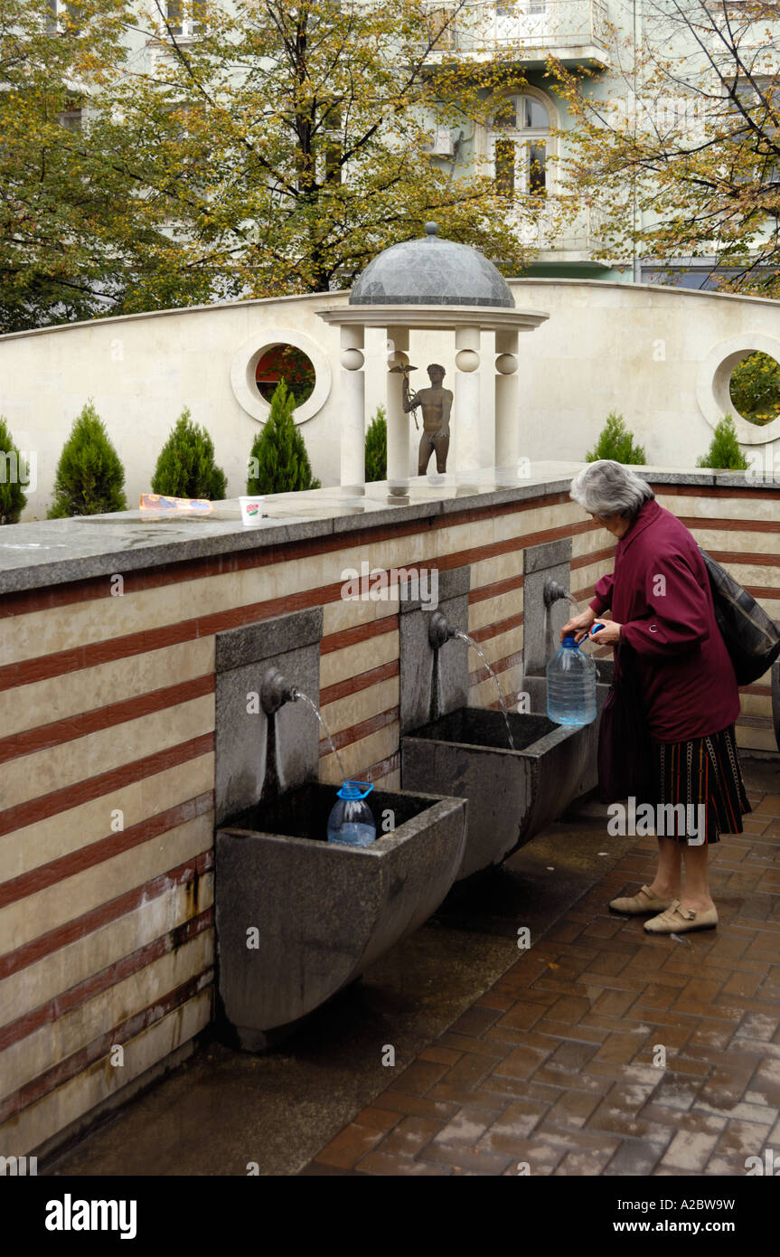 Bulgarians filling hot spring mineral water at drinking fountains Sofia ...