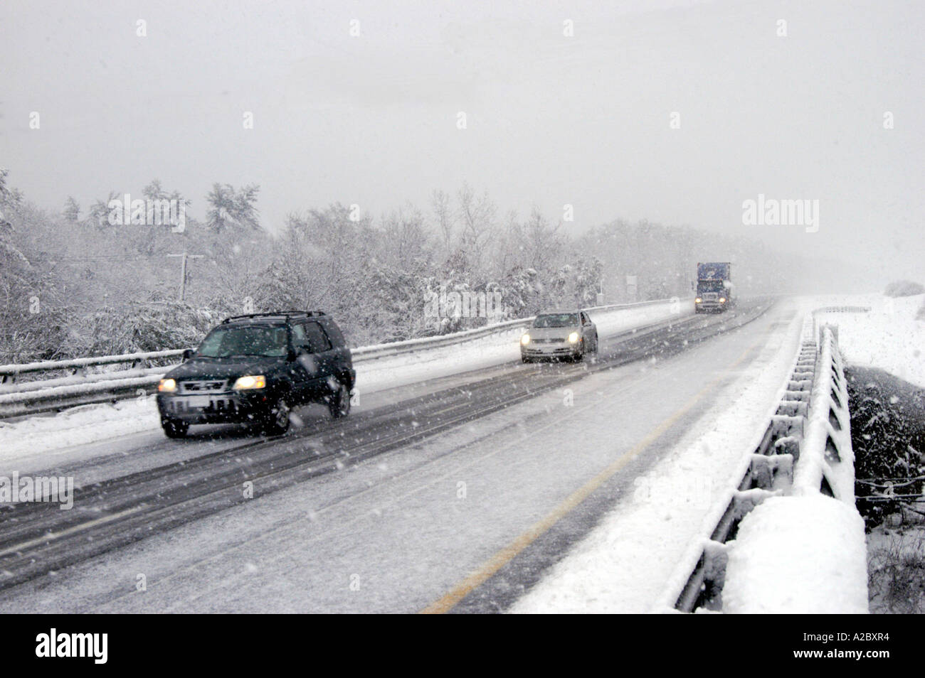 Cars and Truck on Interstate Highway during Snowstorm Stock Photo - Alamy