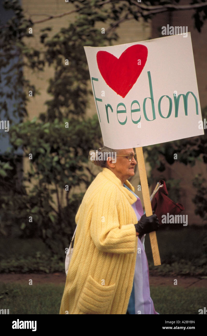 Woman carring a "I love Freedom" sign. St. Paul, Minnesota Stock Photo ...