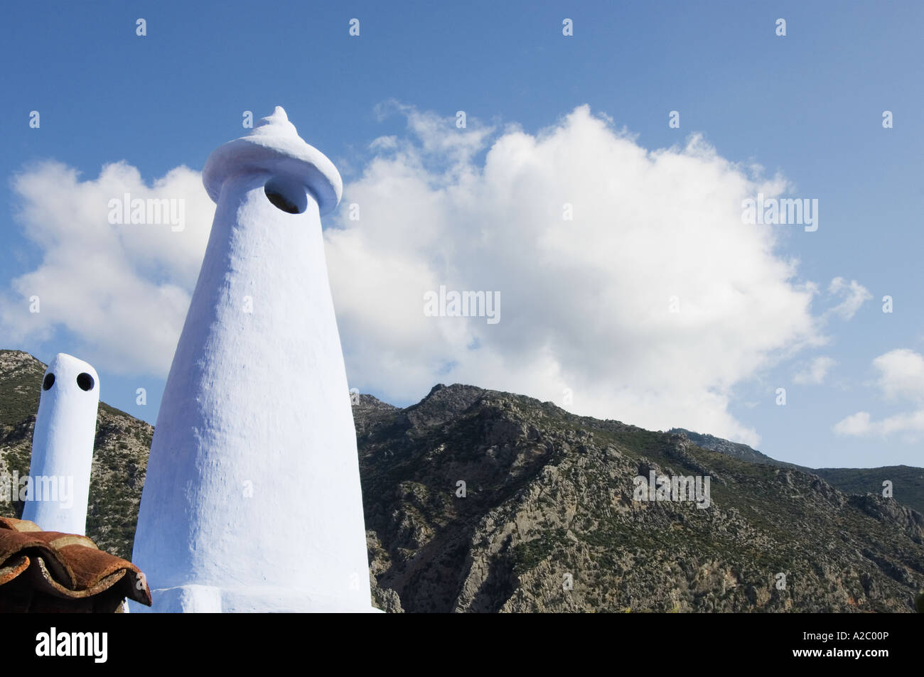 Chimneys of Casa Hassan against Rif mountains restored traditional ...