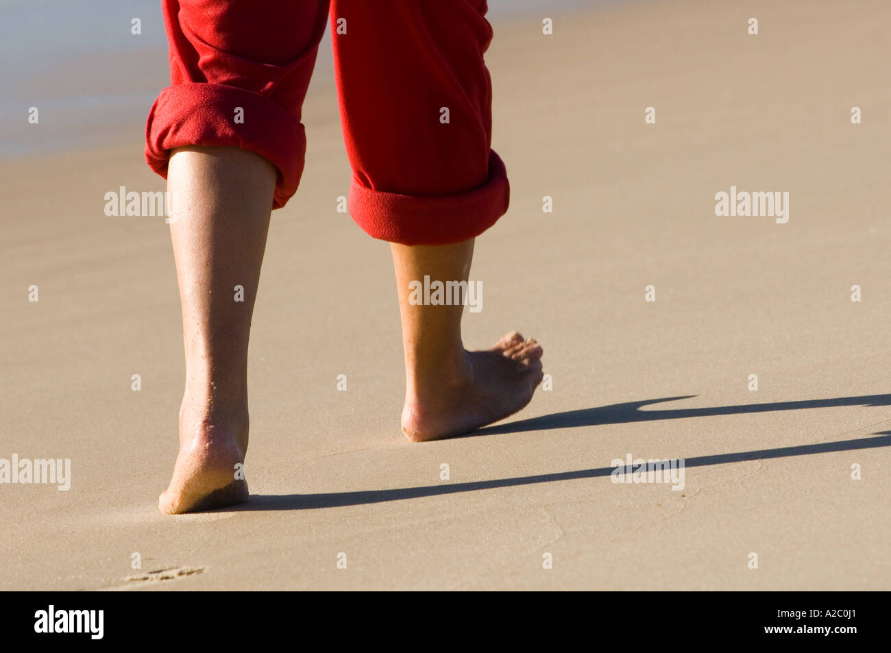 Walking Across Sand Stock Photo - Alamy
