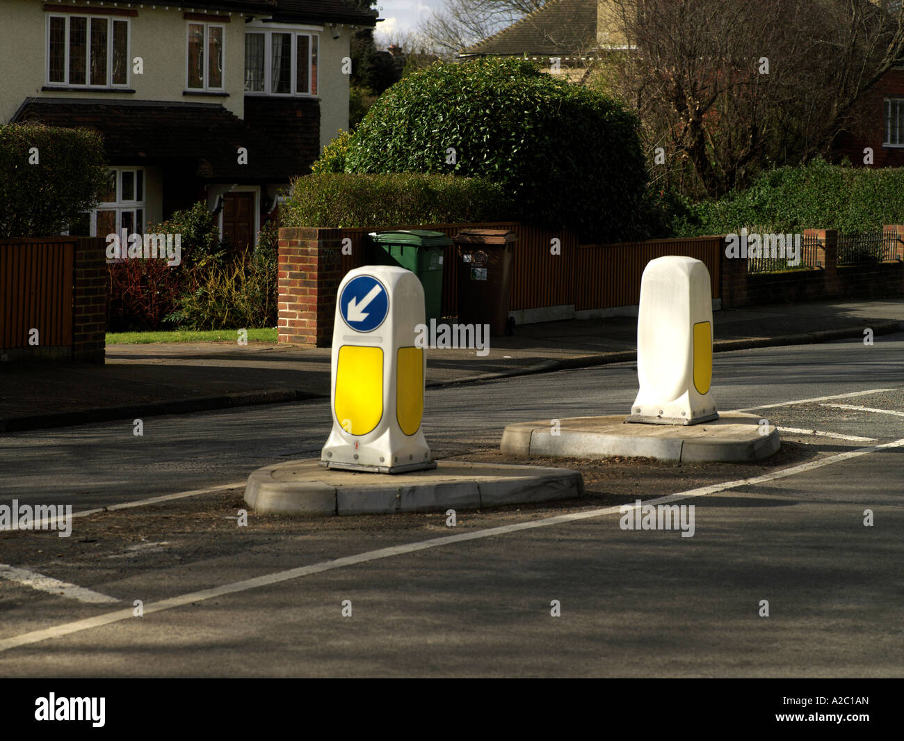 Bollards on Pedestrian Refuge Island Stock Photo - Alamy