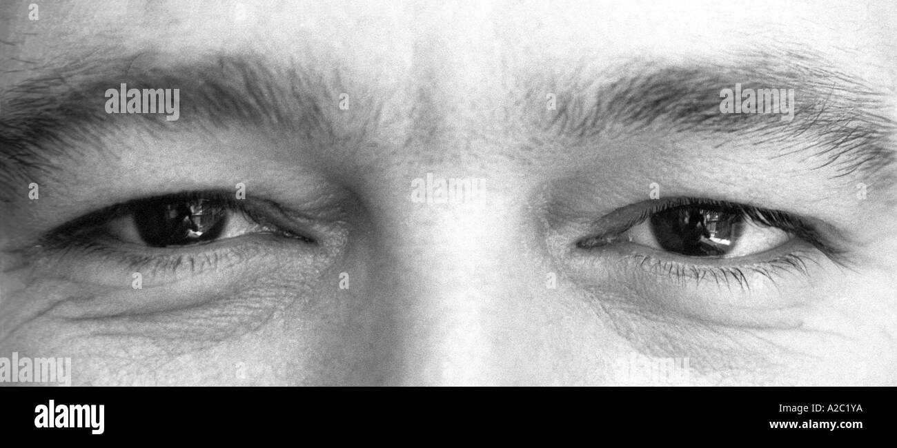 Eyes of a man looking at camera Stock Photo - Alamy