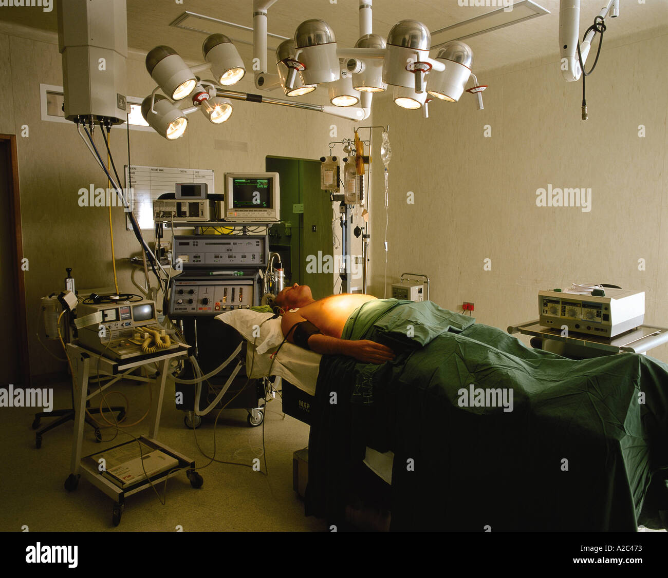 MAN LYING ON OPERATING TABLE Stock Photo - Alamy