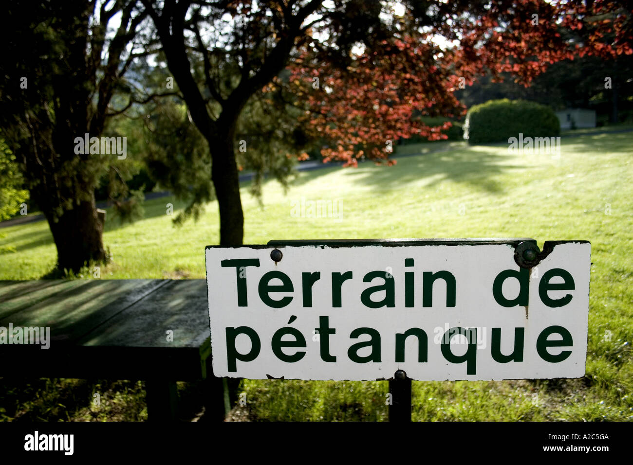Petanque pitch sign for in French campsite Stock Photo - Alamy