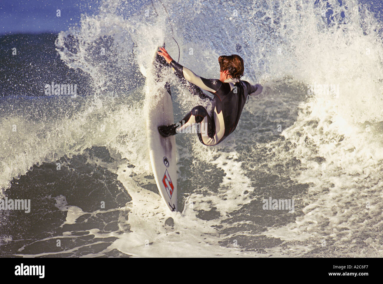 Horizontal shot of surfer surfing Stock Photo - Alamy