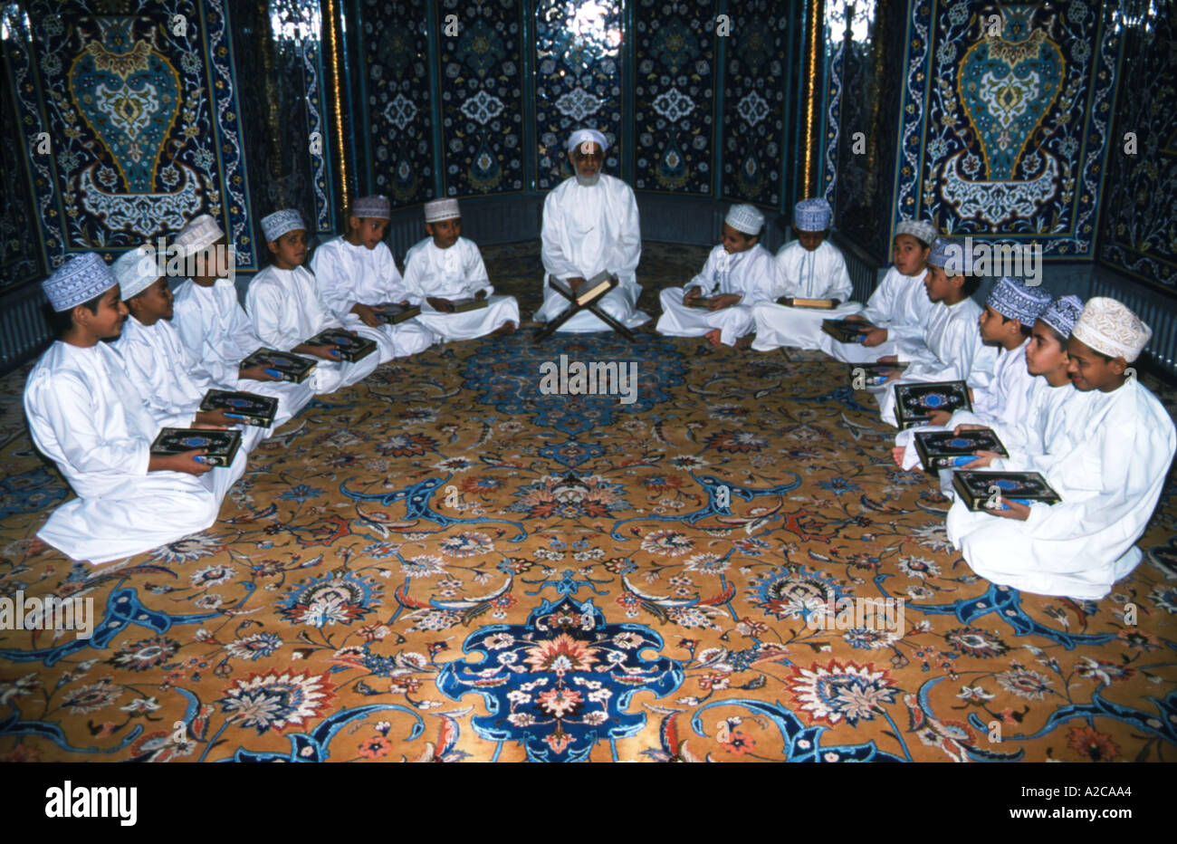 A Quran class in the Sultan Qaboos Mosque in Muscat, Oman Stock Photo ...
