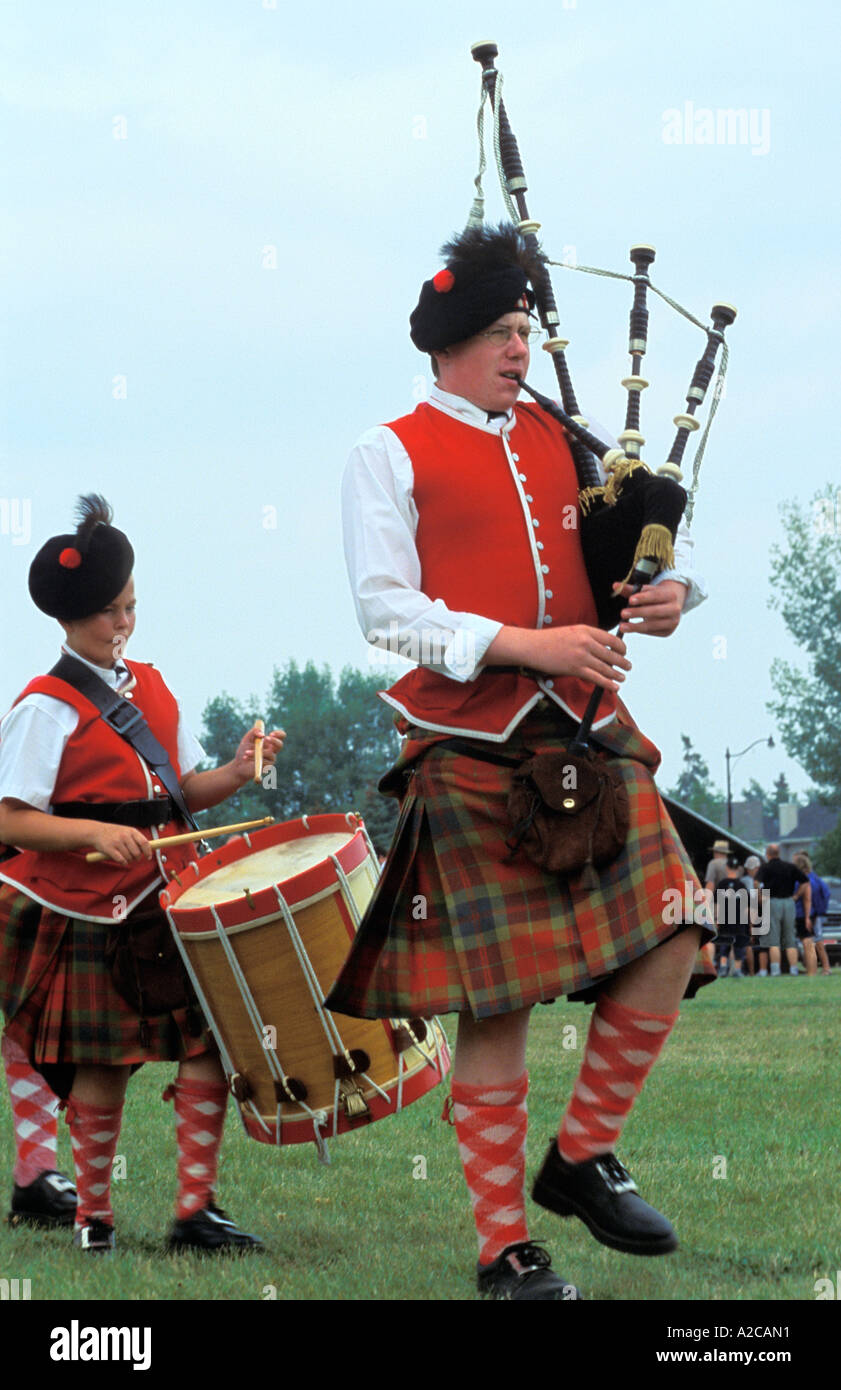 Teenage musicians marching in reenactment of Scottish regiment Stock ...