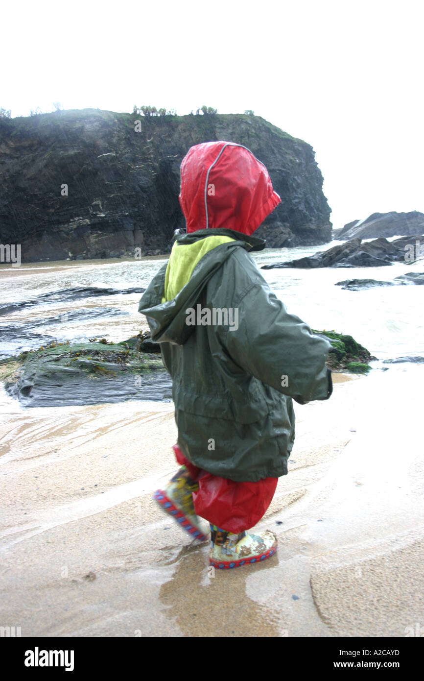 In rain on beach hi-res stock photography and images - Alamy
