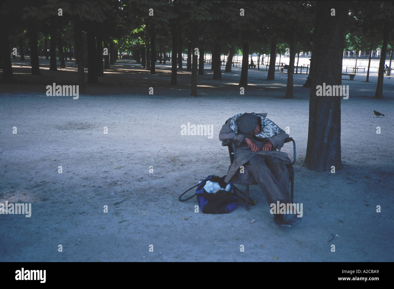 A homeless man in the Tuilery gardens Paris Stock Photo - Alamy