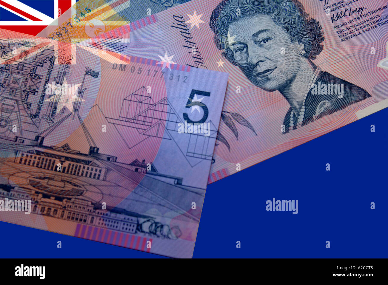 Australian 5 dollar notes against a cutout shape of Australia and their ...