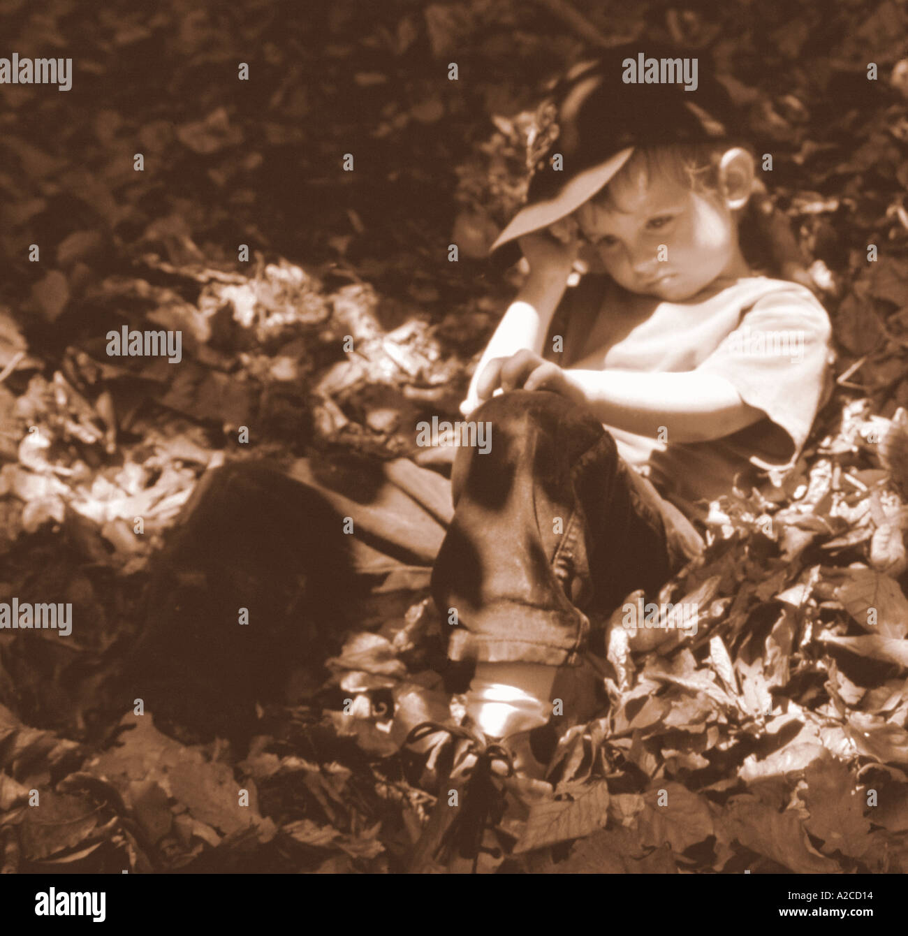 Tired little boy Stock Photo - Alamy