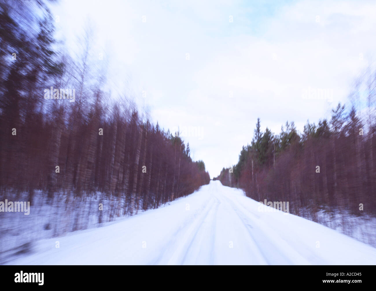 Snow covered road Finland Stock Photo - Alamy