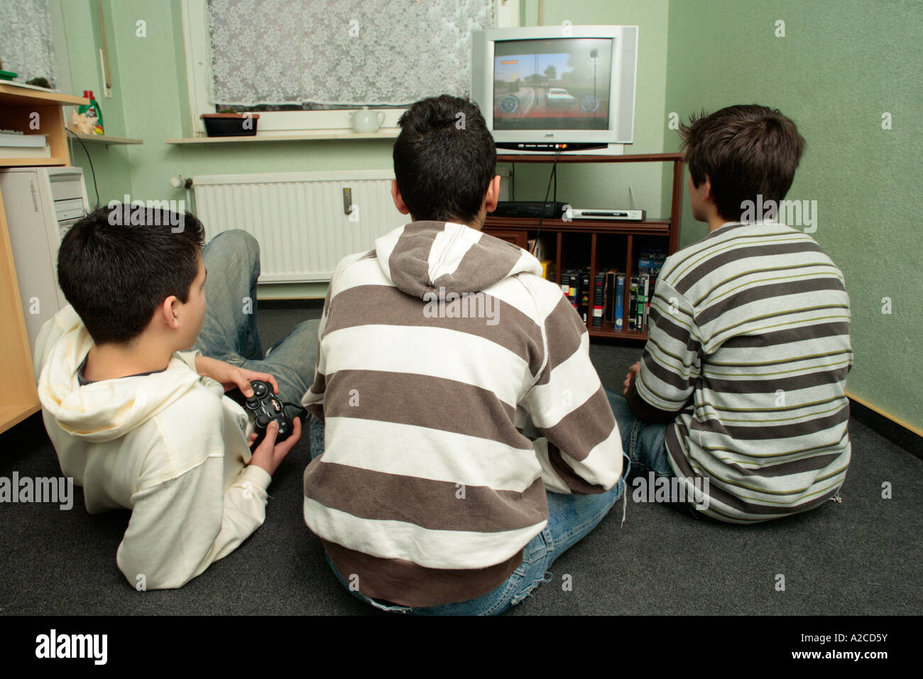 boys playing a video game Stock Photo - Alamy