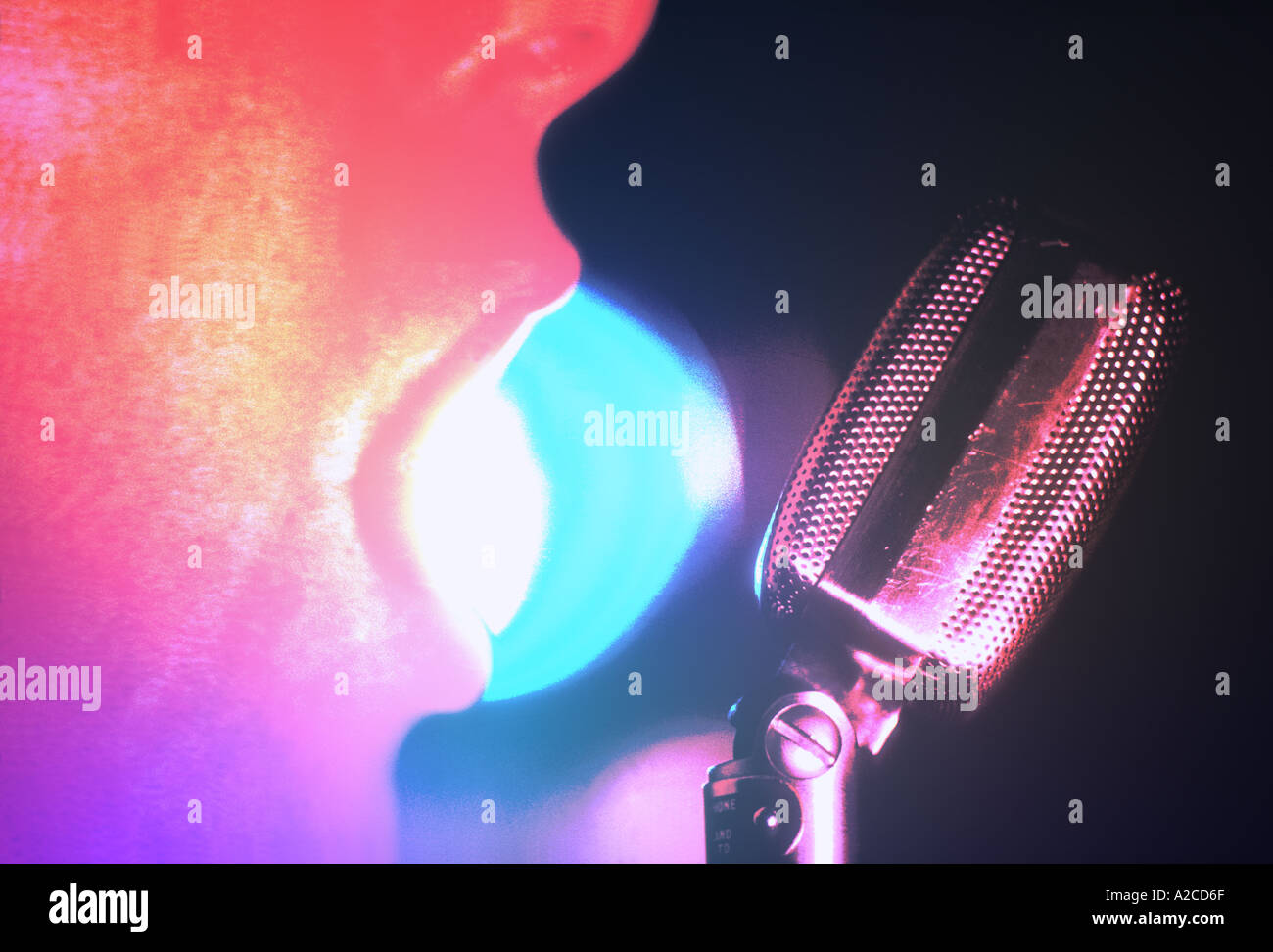 Singer with microphone Stock Photo - Alamy