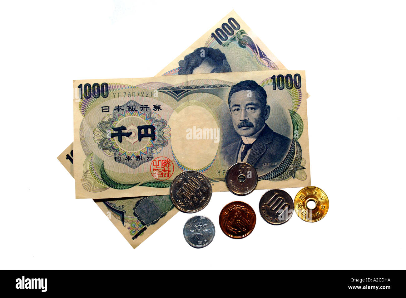 Japanese Yen money against a white background Stock Photo - Alamy