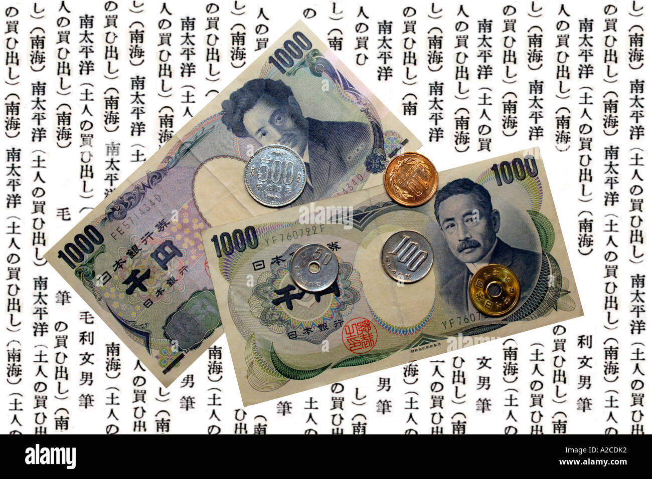 Japanese 1000 Yen notes and coins against a written background Stock ...