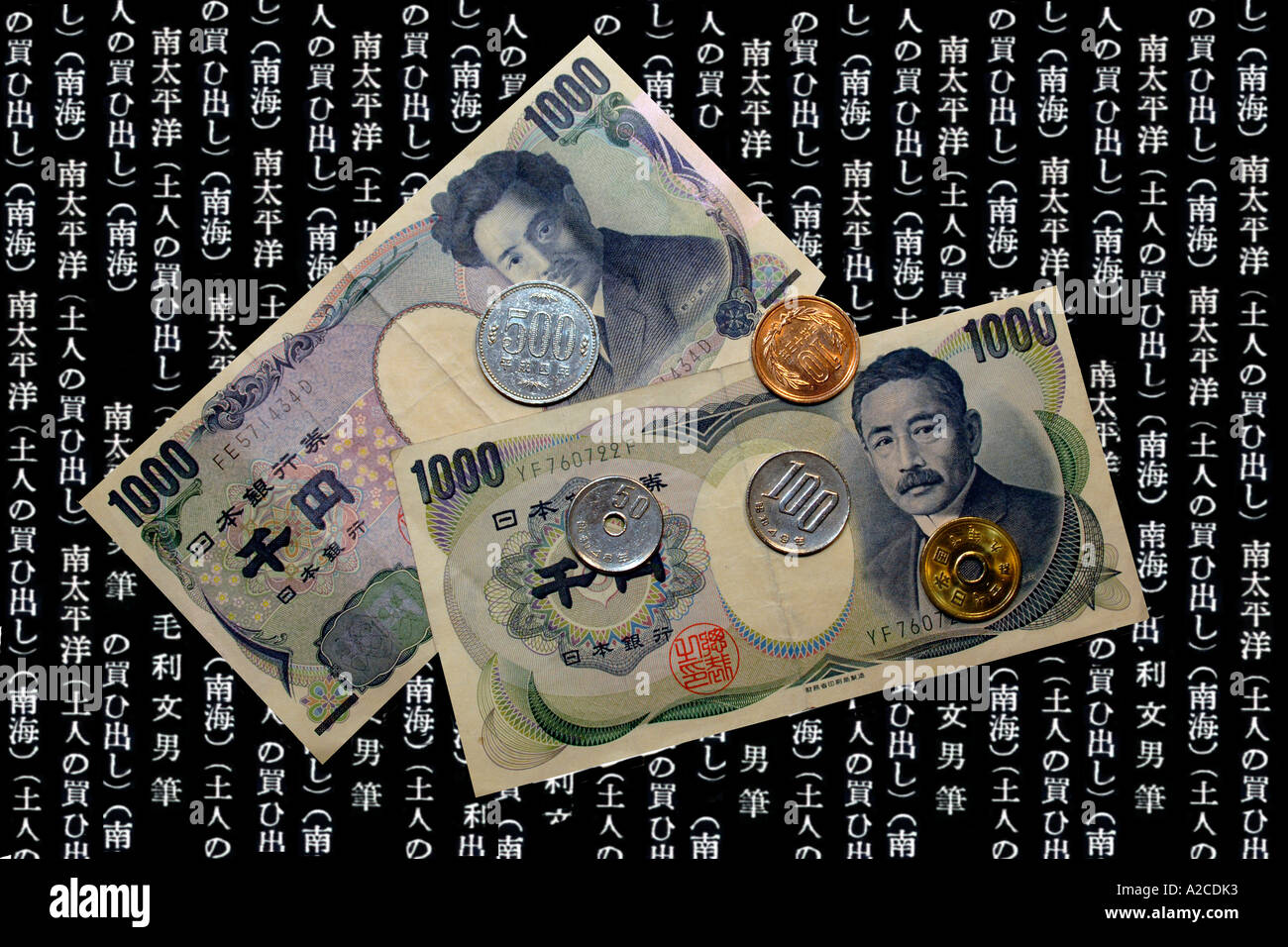 Japanese 1000 Yen notes and coins against a written background Stock ...