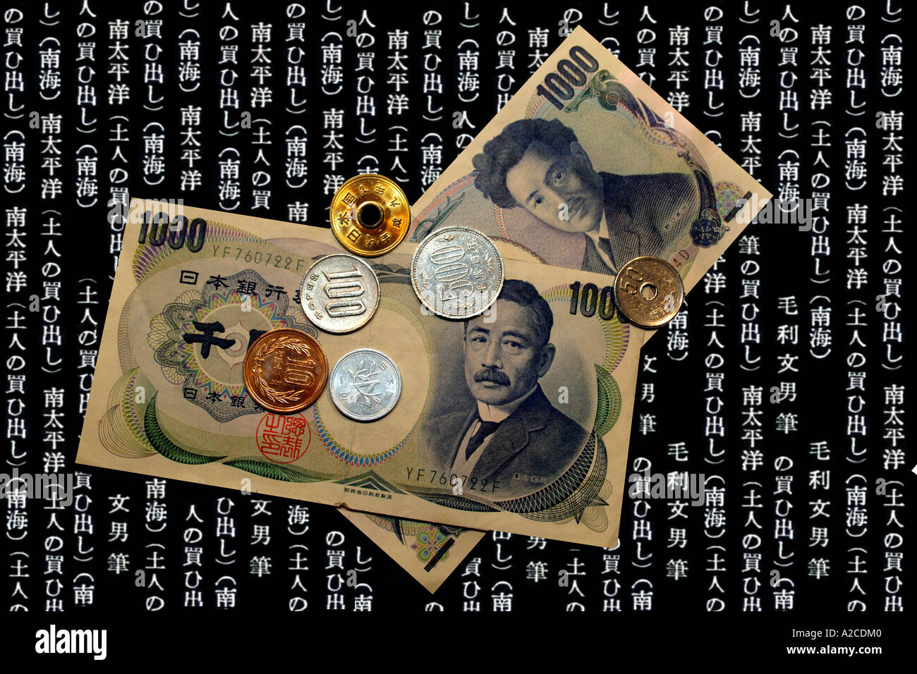 Japanese 1000 Yen notes and coins against a written background Stock ...