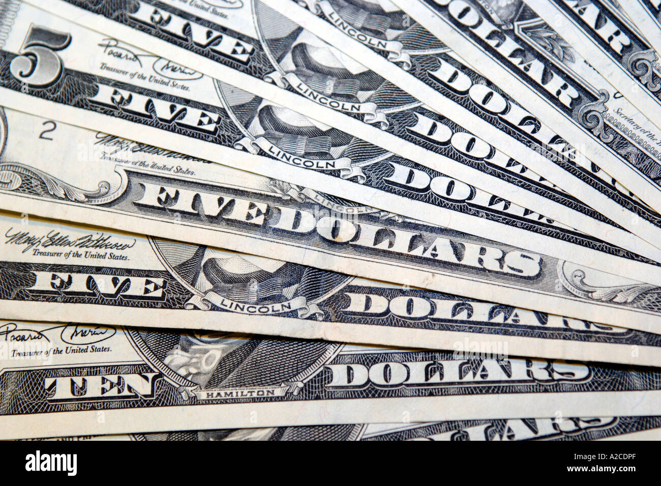 A Close up of a selection of American Five Dollar bills Stock Photo - Alamy