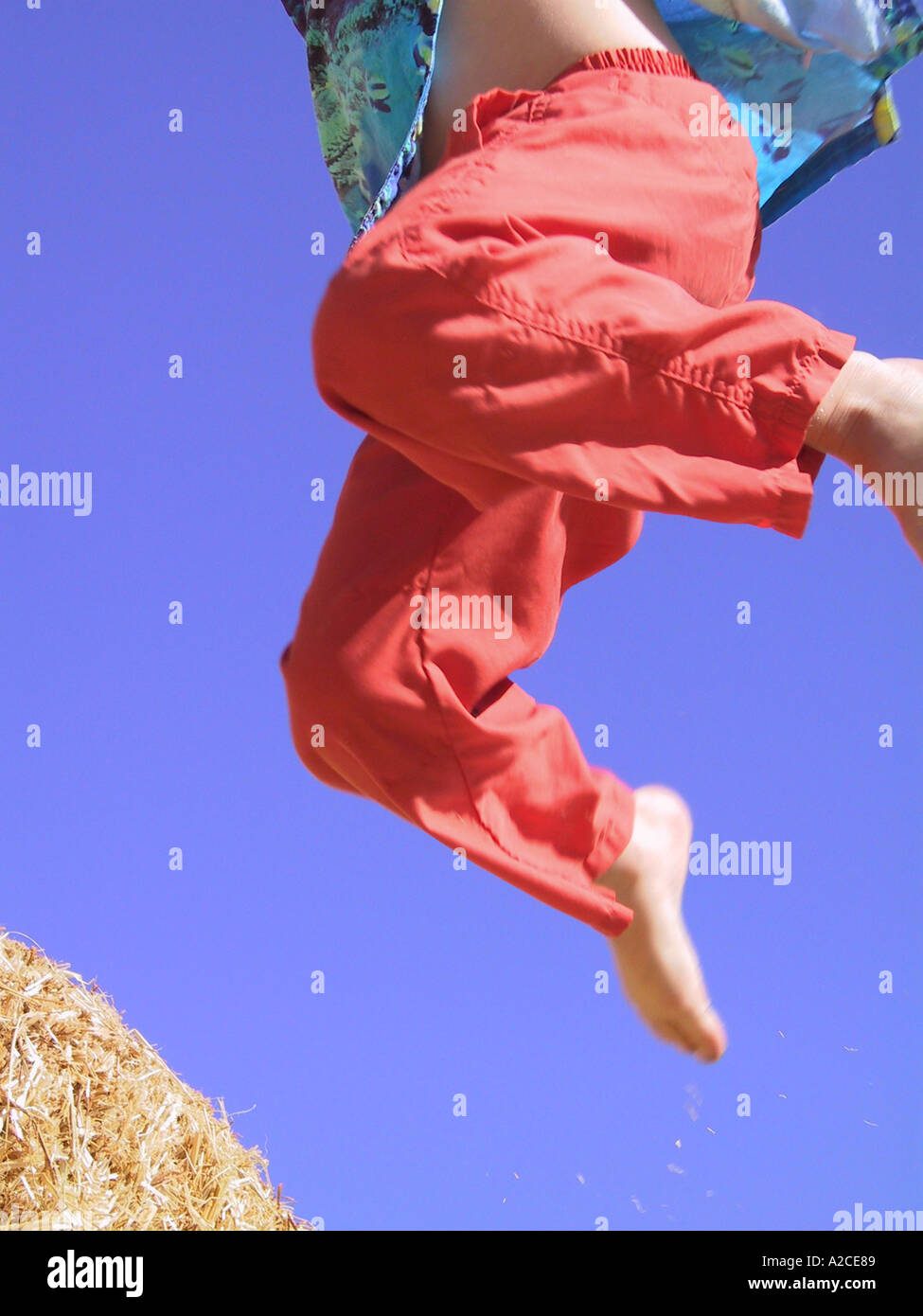 Year old boy jumping hi-res stock photography and images - Alamy