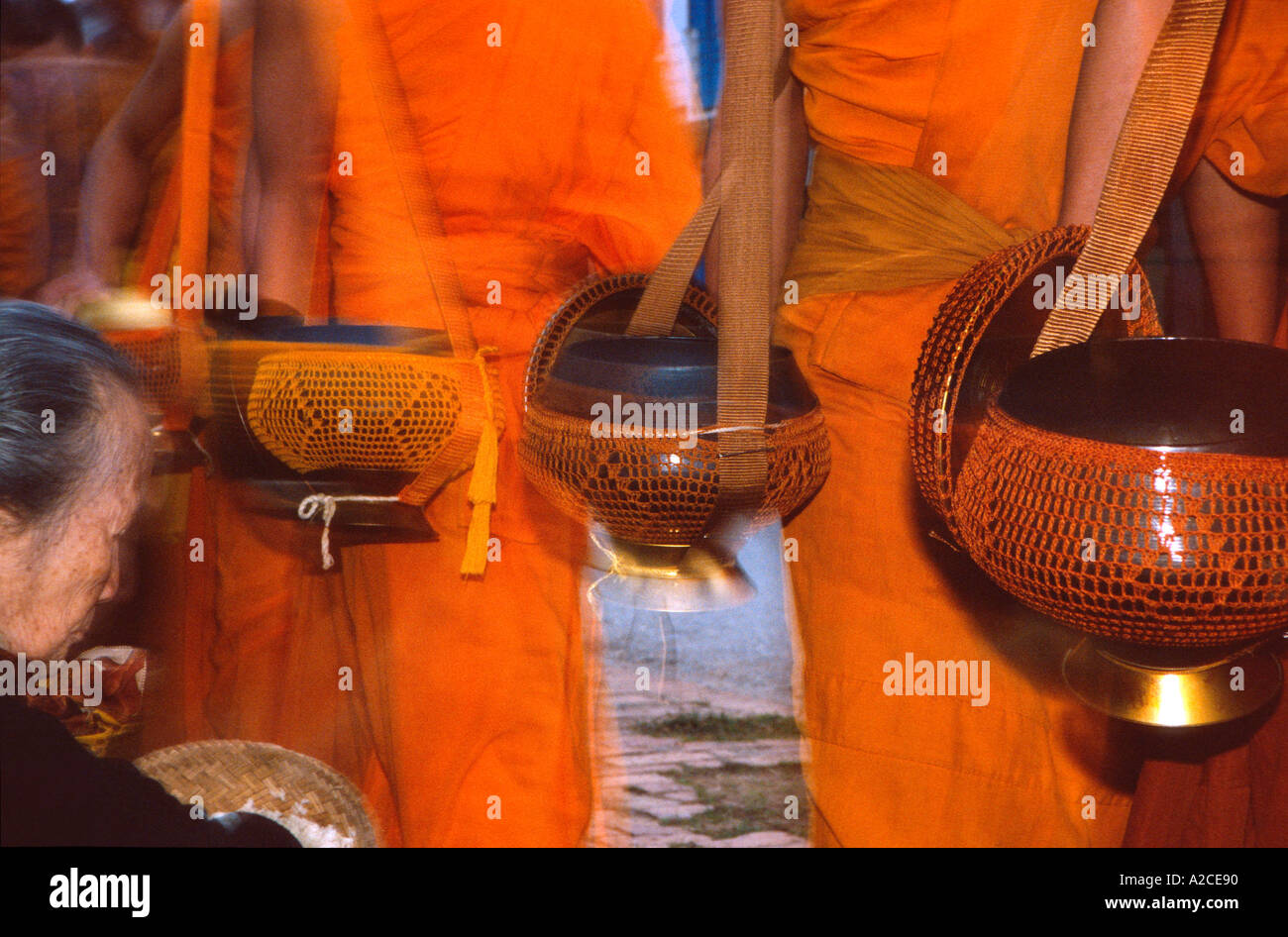 Monks on their morning alms round, Luang Prabang, Laos Stock Photo - Alamy