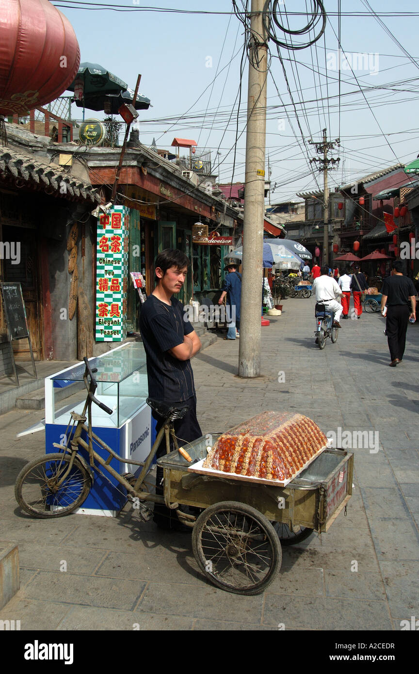 Man selling food in the back streets, beijing China Stock Photo - Alamy