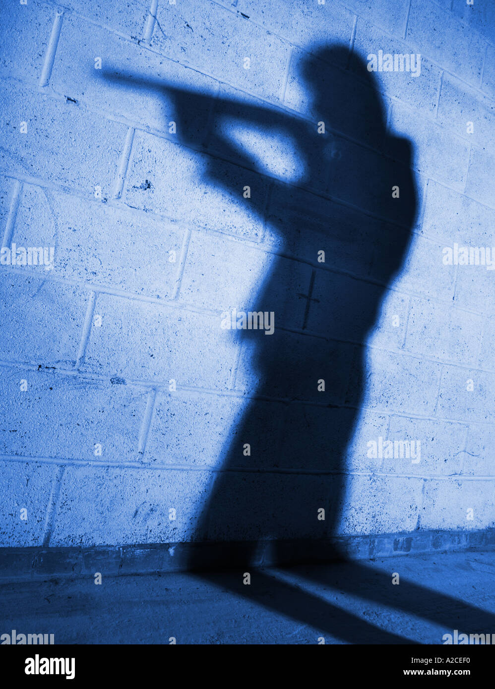 Shadow or silhouette of man pointing and aiming a shotgun Stock Photo ...