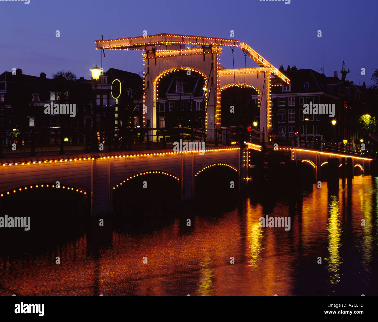 Amsterdam Magere Brug Skinny Bridge by night Stock Photo - Alamy