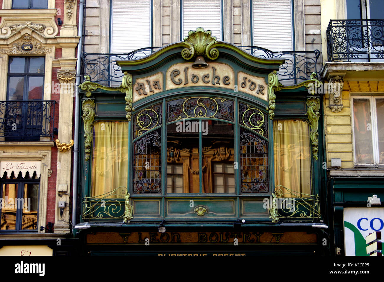 An elaborate Art Nouveau style shop front in a street in the city of ...