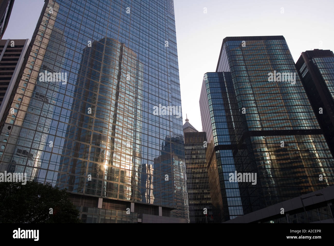 Reflection of an office block in the glass frontage of a modern ...