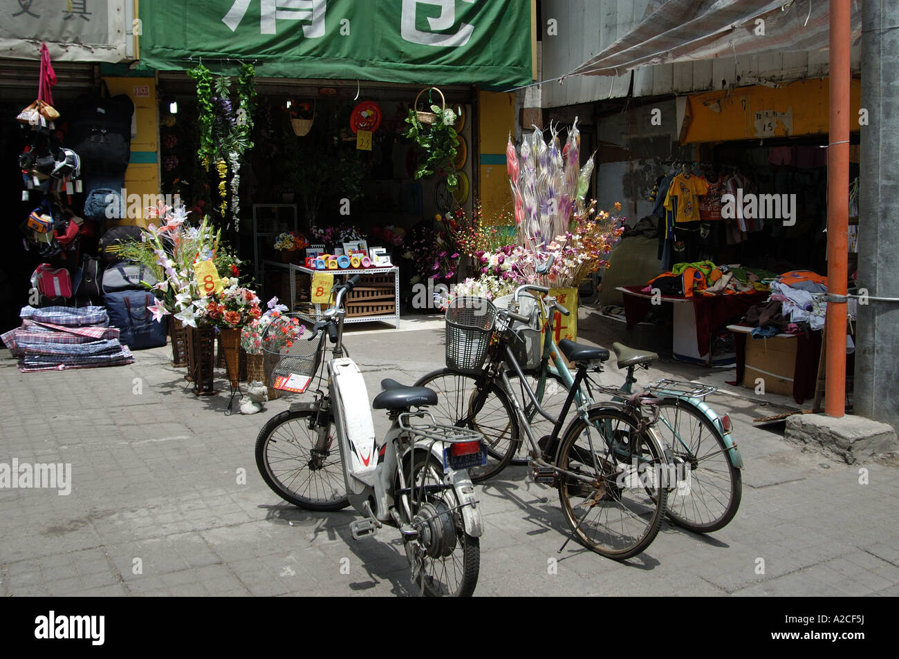 Bikes outside local shop, Chengdu China Stock Photo - Alamy
