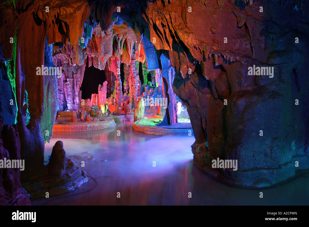 Colourful lights illuminate Lotus Cave, Guangxi China Stock Photo - Alamy