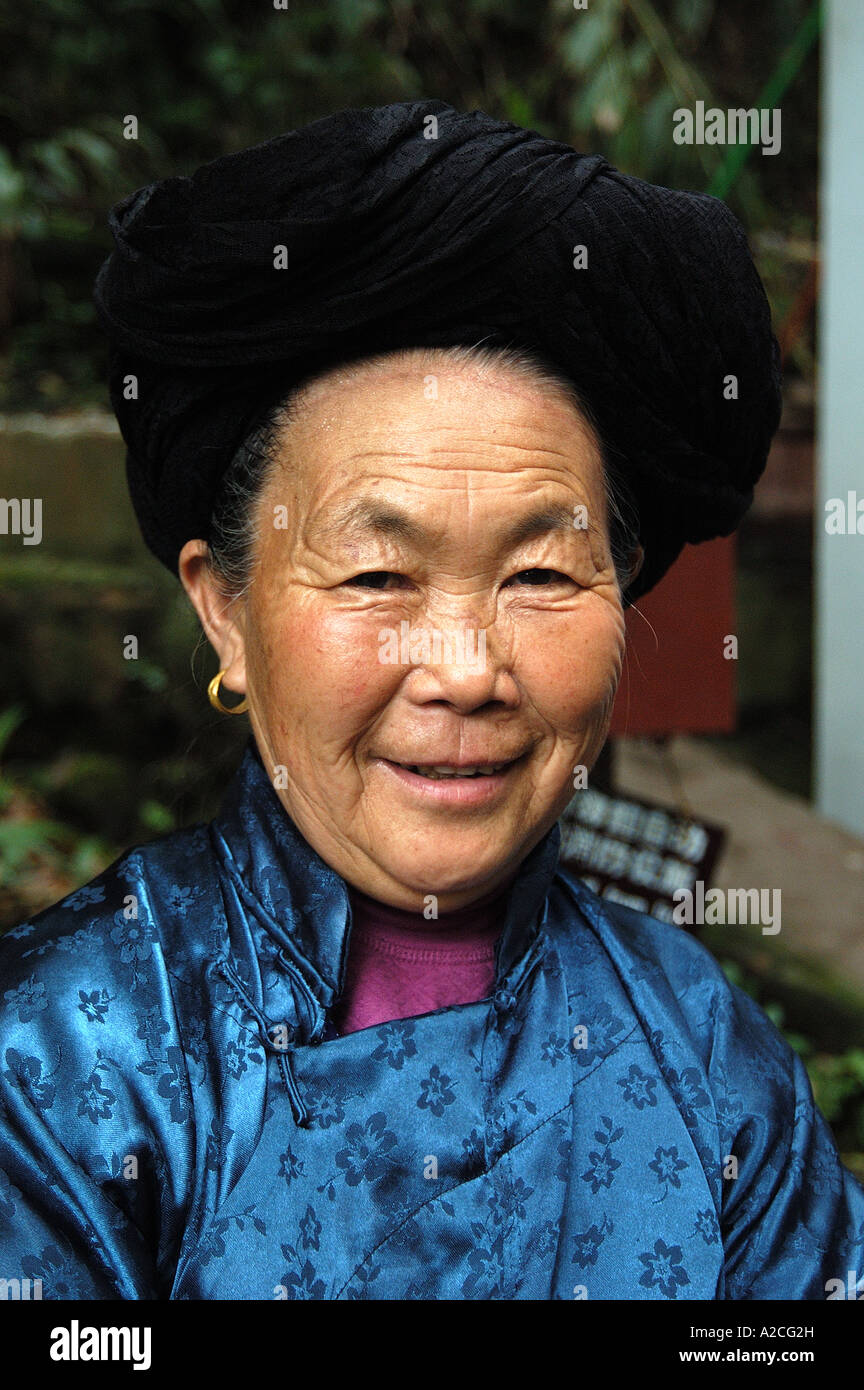 Woman in traditional dress at the Grand Buddha, Leshan China Stock ...