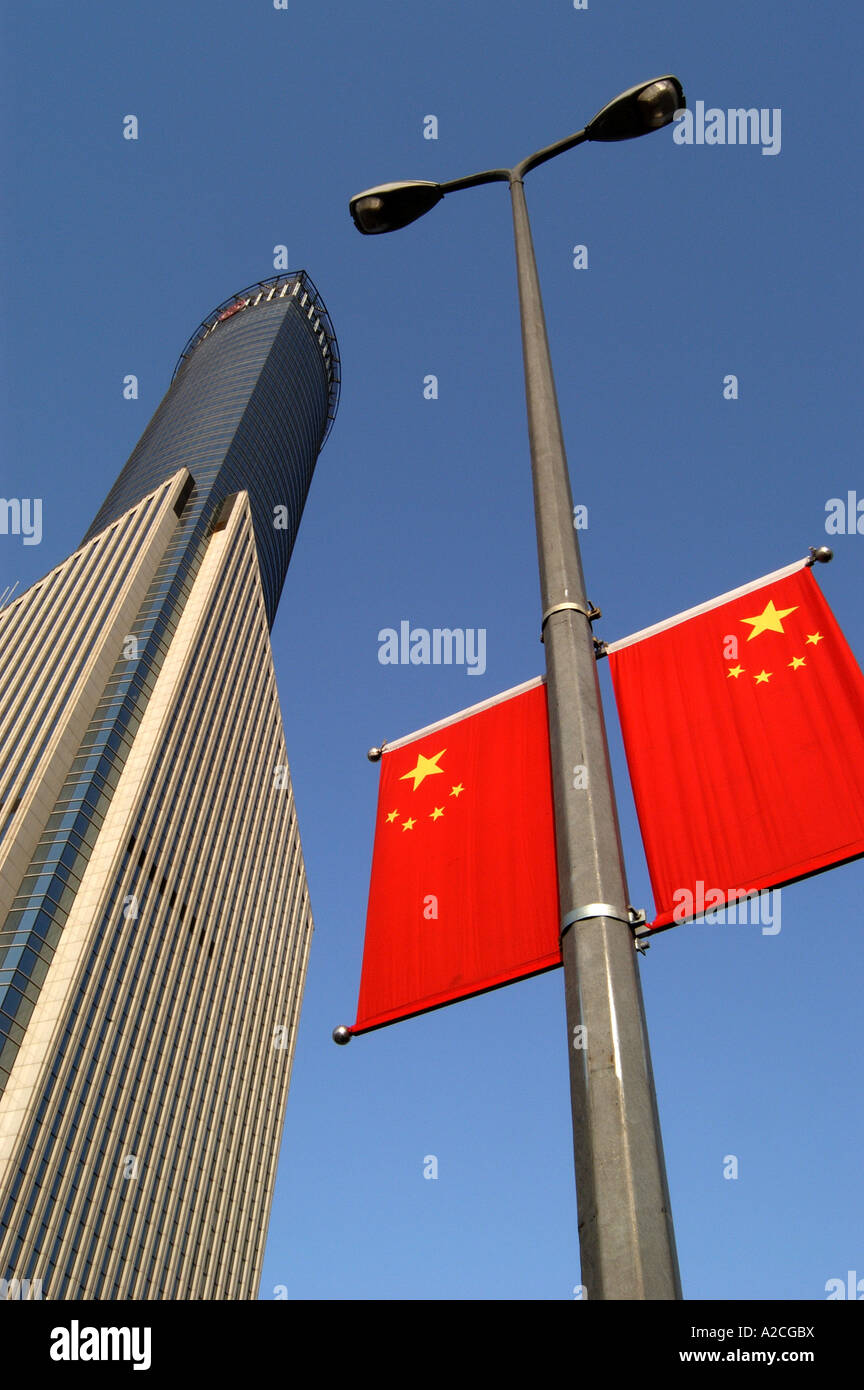 Chinese flags and high-rise building of Pudong New Area, Shanghai China ...