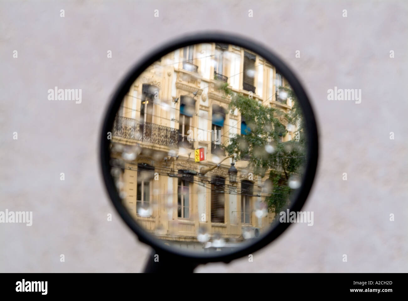 Building reflected in read view mirror Stock Photo - Alamy