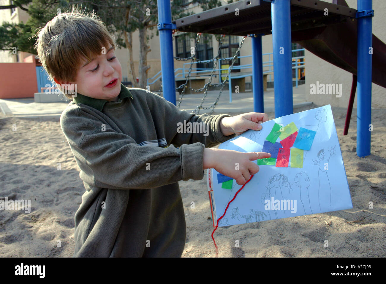five year old explaining a picture he drew Stock Photo - Alamy