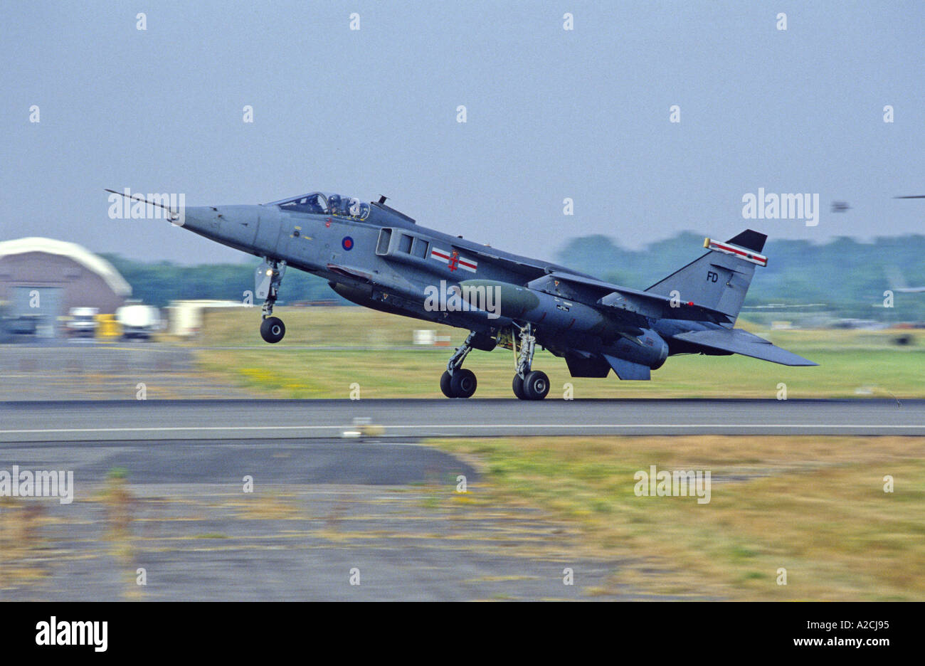 RAF Jaguar GR3 ground attack aircraft landing Stock Photo - Alamy
