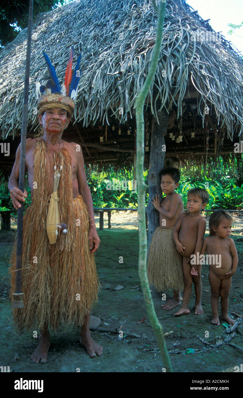 The chief of an Indian Yagua Tribe living near Iquitos with children ...