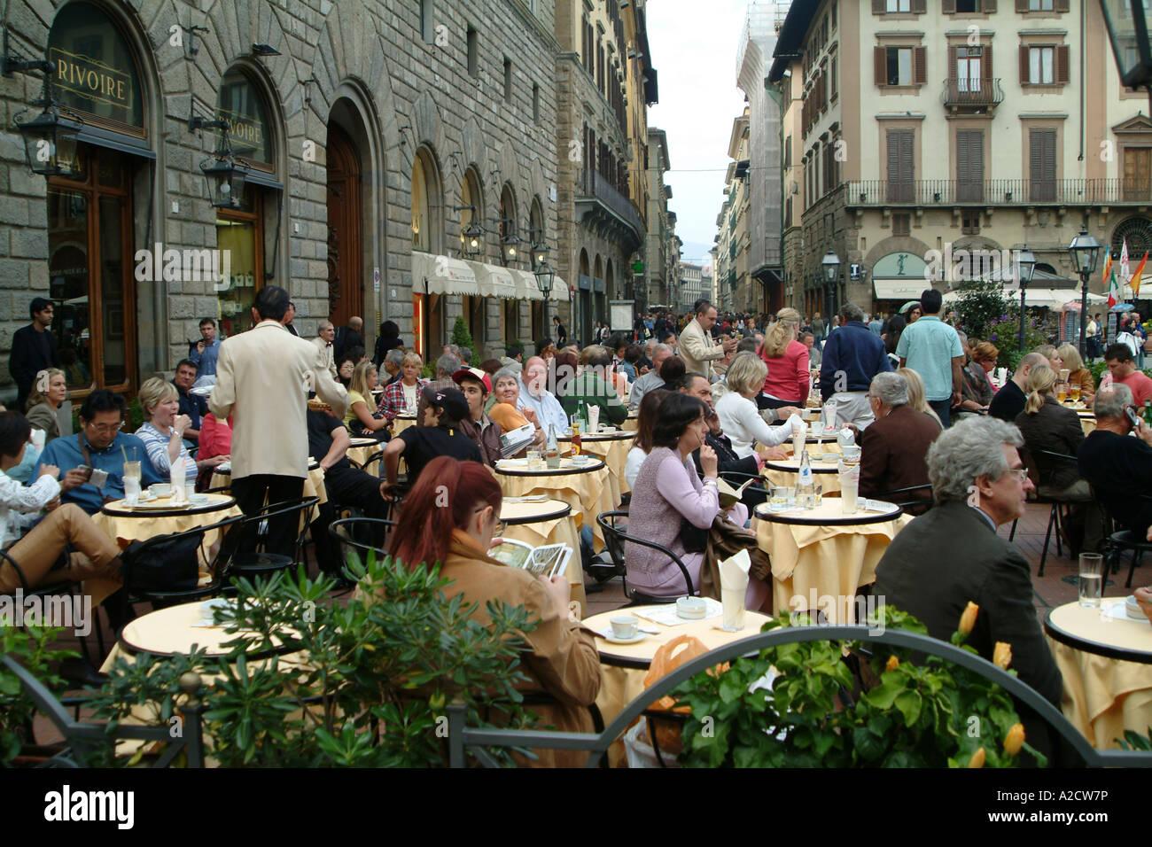 People eating at a street cafe in Florence, Italy Stock Photo - Alamy