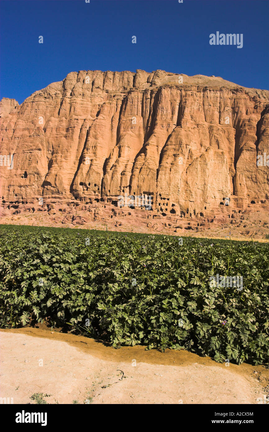 AFGHANISTAN Bamiyan Province Caves in cliffs near empty niche where the ...
