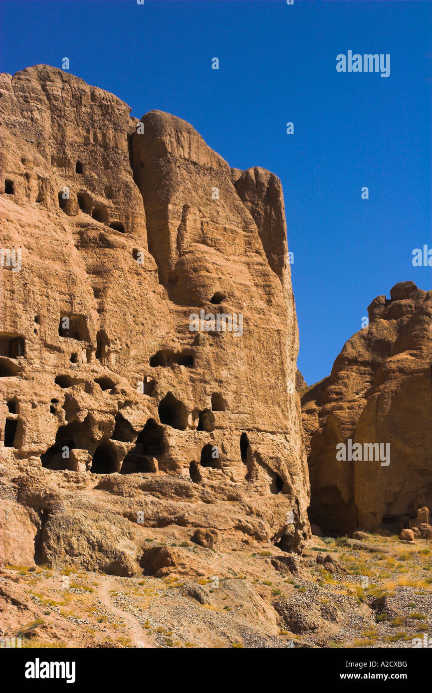AFGHANISTAN Bamiyan Province Caves in cliffs near empty niche where the ...