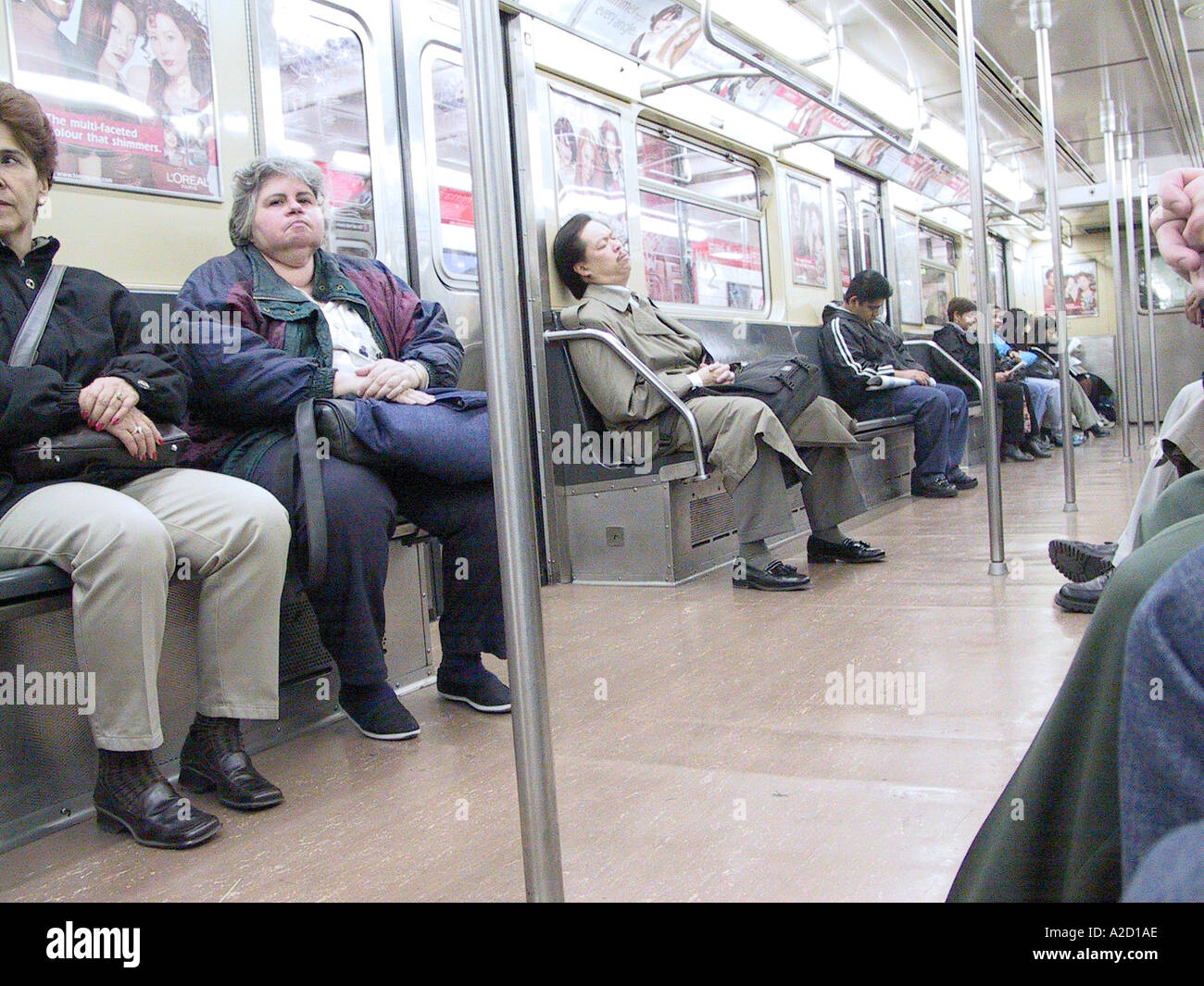 Businessman riding subway train hi-res stock photography and images - Alamy