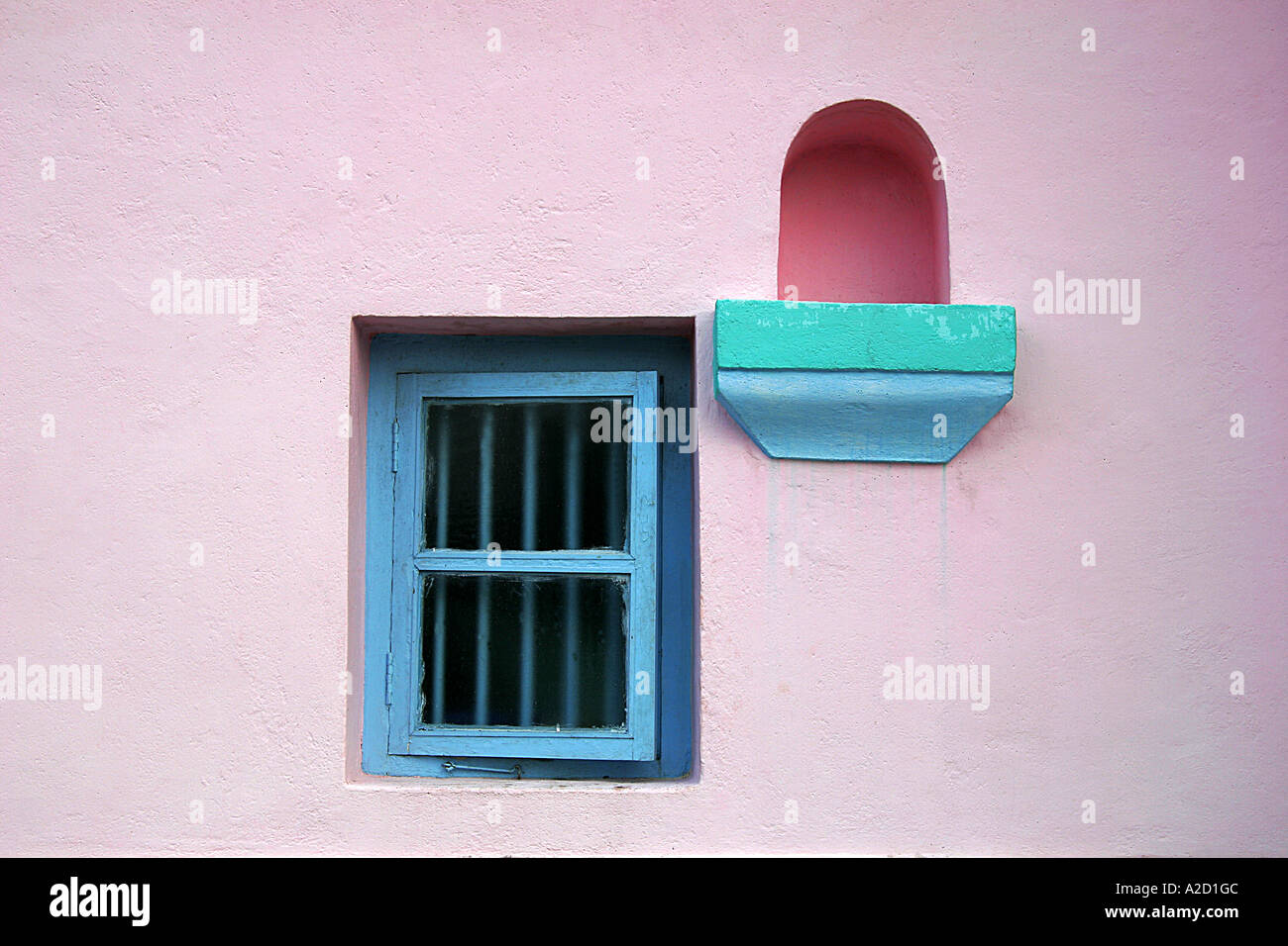 blue wooden window and red alcove with green base and pink painted ...