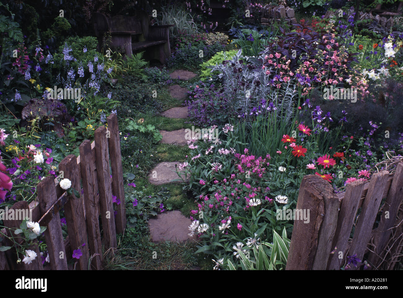 Cottage planted garden looking through gate Chelsea Flower Show 2002 ...